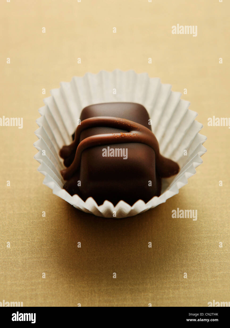 Chocolate truffle in cake case Stock Photo - Alamy