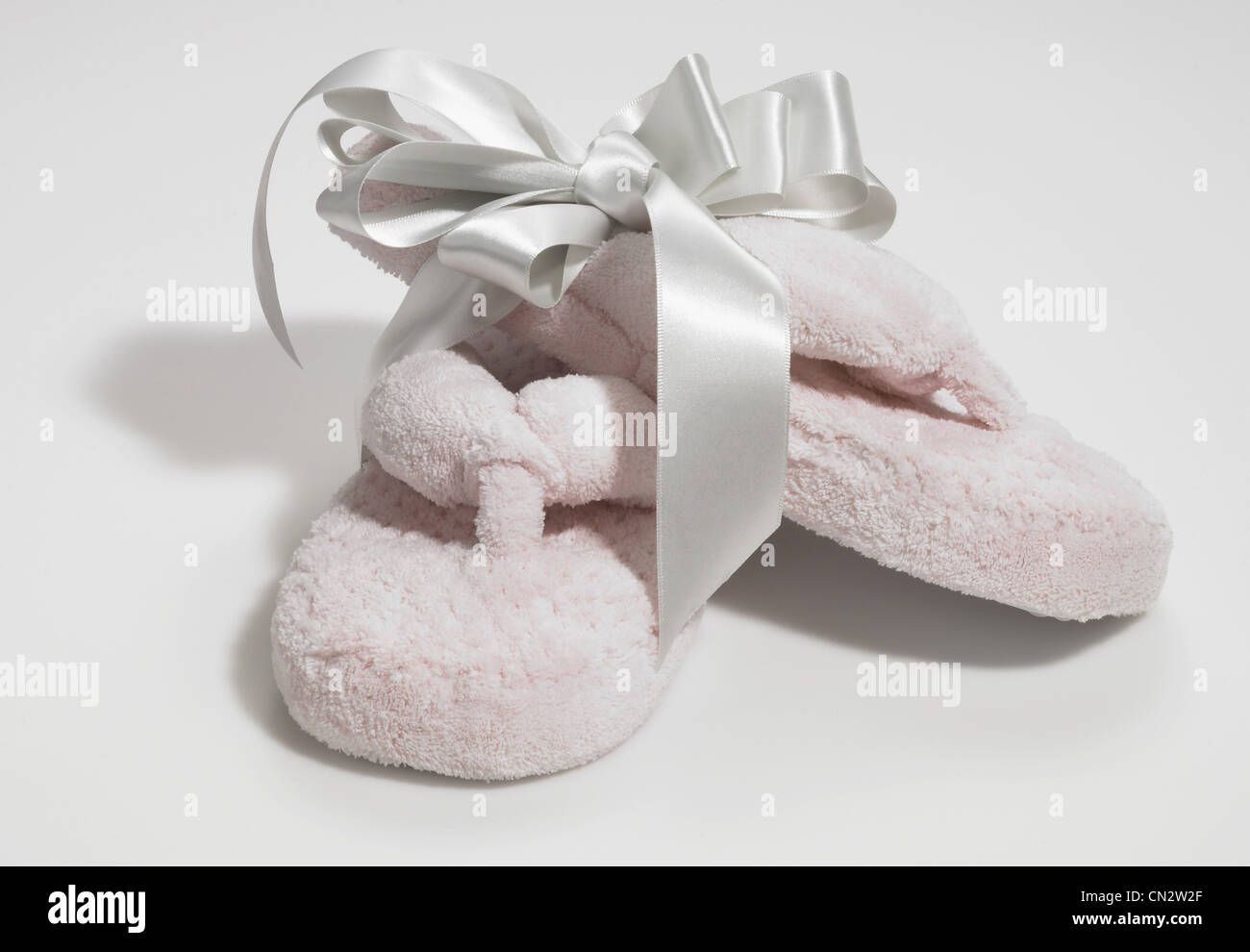 Slippers Wrapped With Bow Stock Photo - Alamy