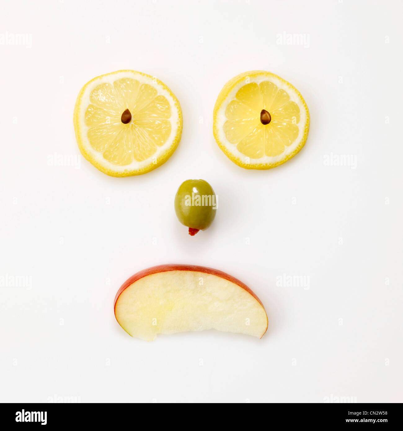 Unhappy fruit face apple hi-res stock photography and images - Alamy
