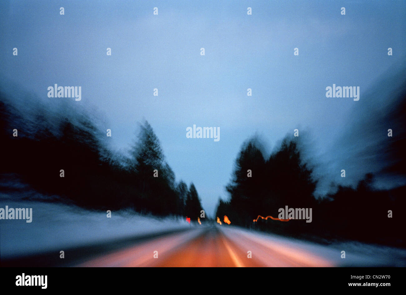 Blurry road in the evening Stock Photo - Alamy