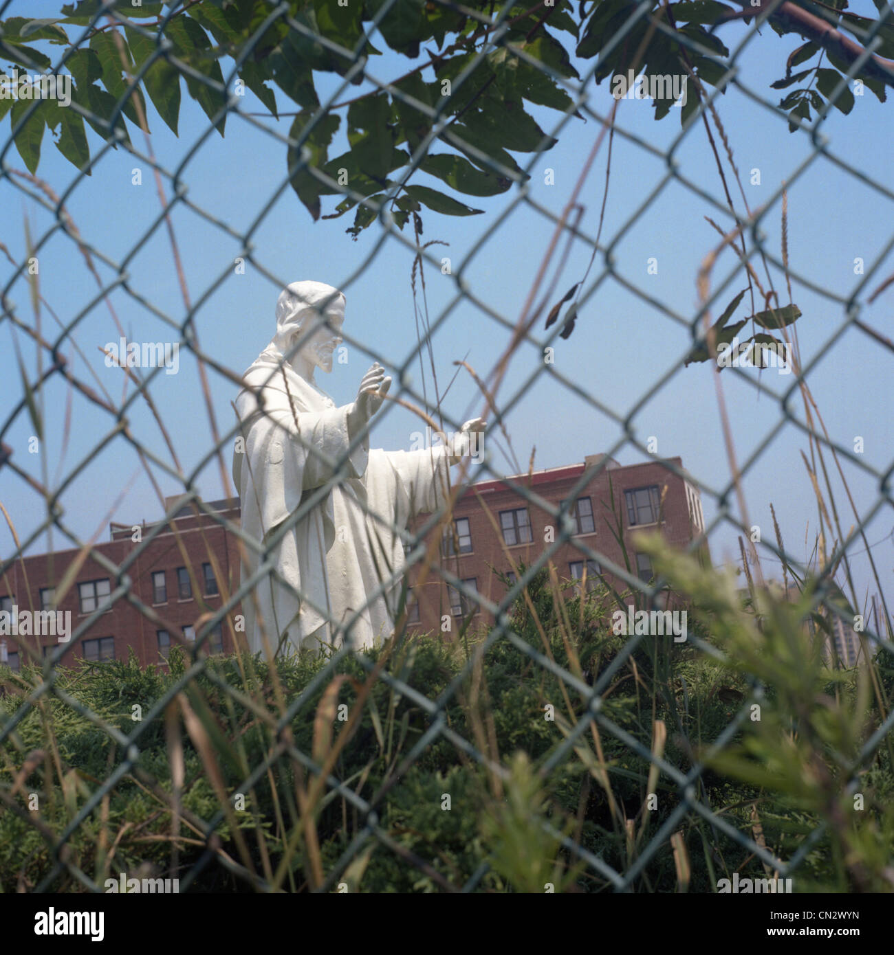 Jesus statue behind fence hi-res stock photography and images - Alamy