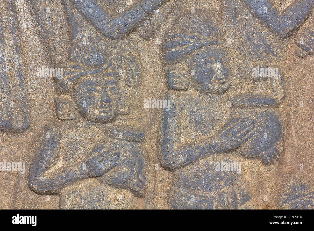 Native art carved on the wall in the temple Stock Photo - Alamy