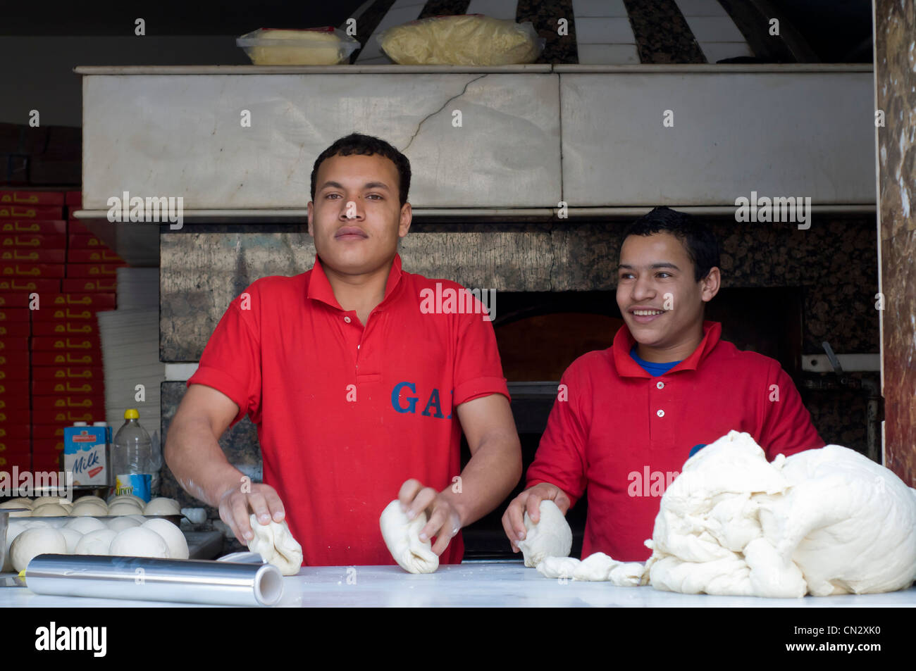 Baker bread young ethnic hi-res stock photography and images - Alamy