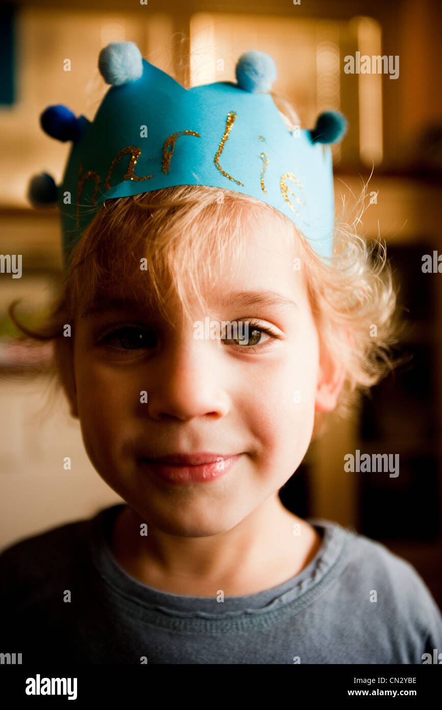Boy wearing paper crown Stock Photo - Alamy