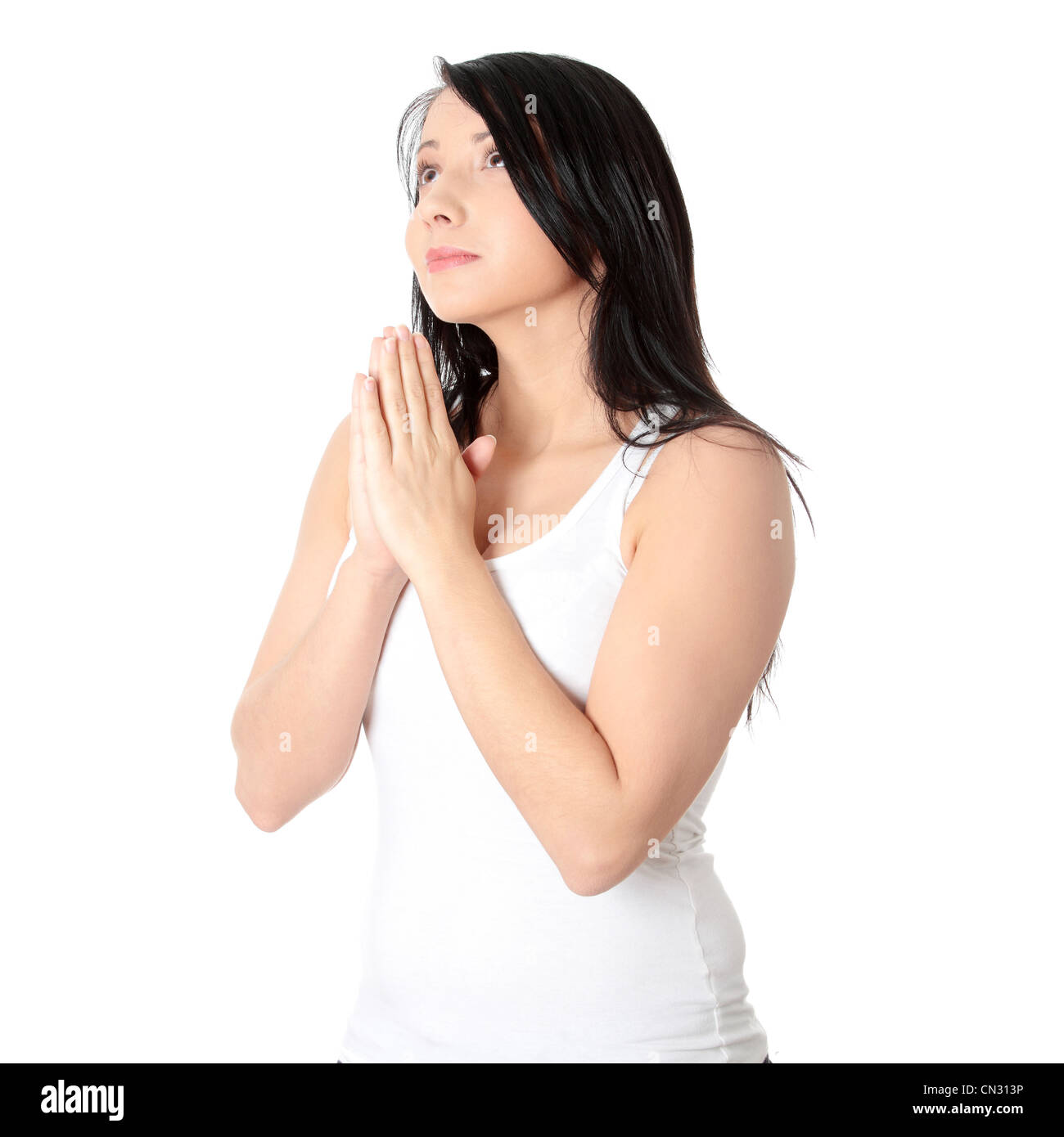 Closeup portrait of a young caucasian woman praying Stock Photo - Alamy