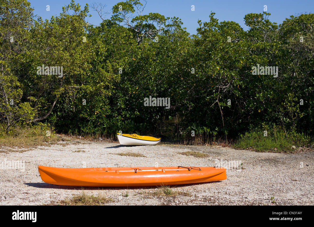 Two kayaks on beach Stock Photo - Alamy
