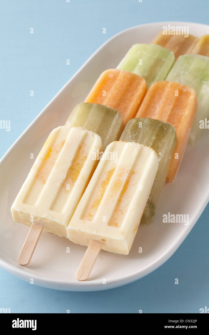 Homemade fruit ice lollies on tray Stock Photo - Alamy