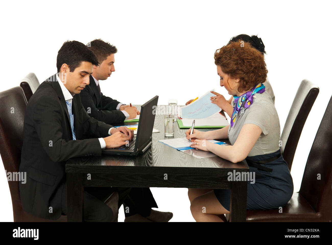 Four business people having meeting against white background Stock ...