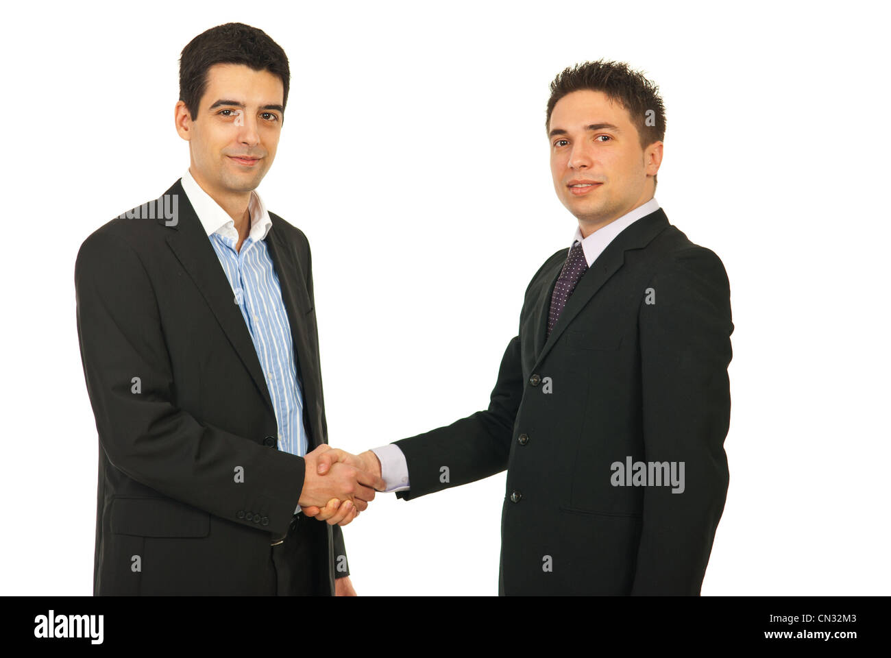 Happy two business men shaking their hands isolated on white background ...