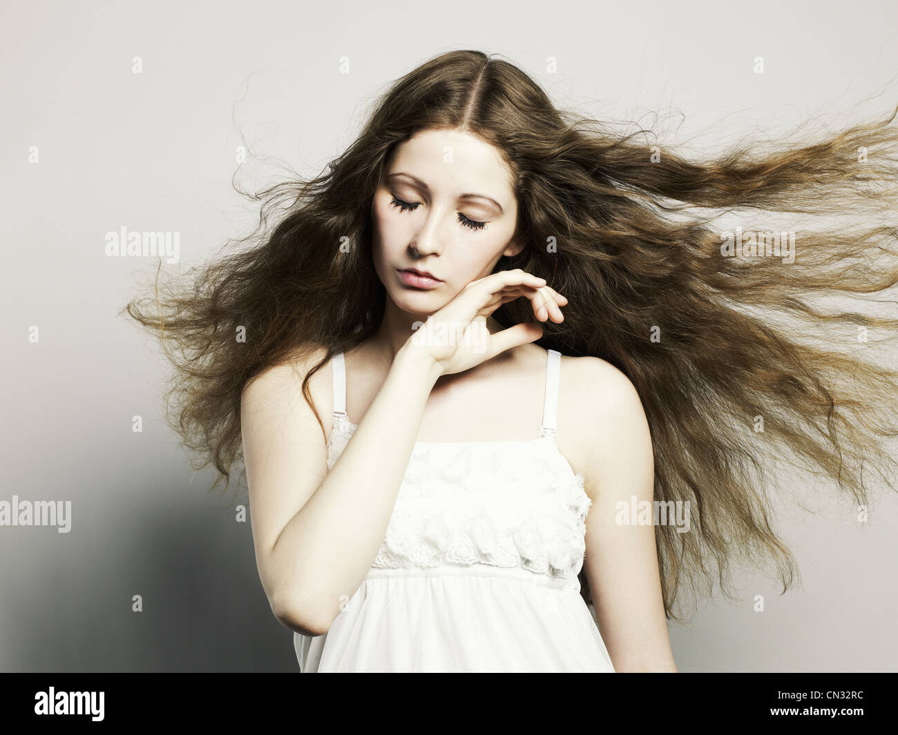 Photo of young beautiful woman with magnificent hair Stock Photo - Alamy
