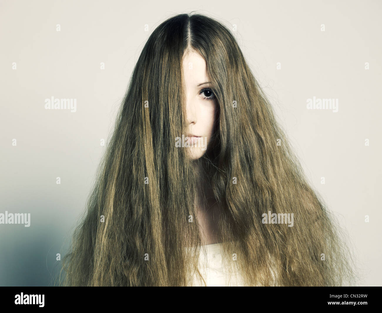 Photo of young beautiful woman with magnificent hair Stock Photo - Alamy