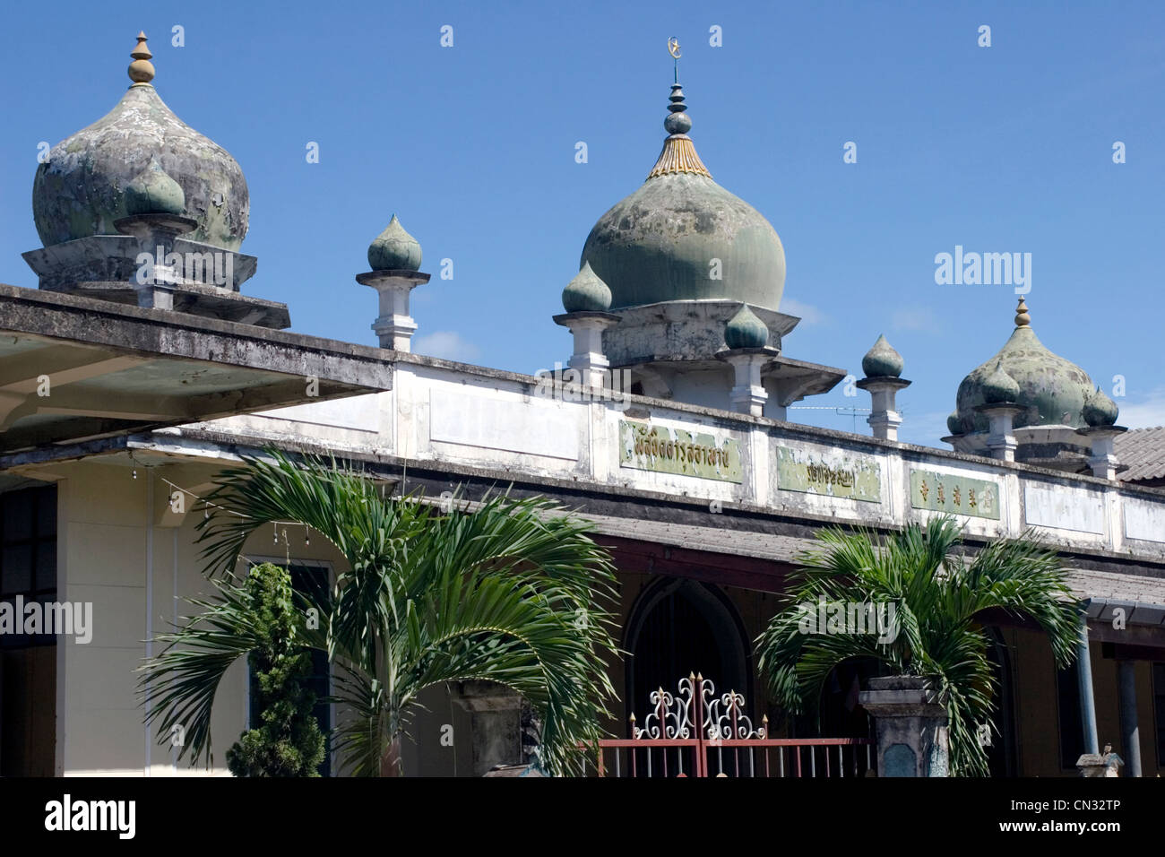 A beautiful Muslim mosque is part of the urban landscape in Chiang Rai ...