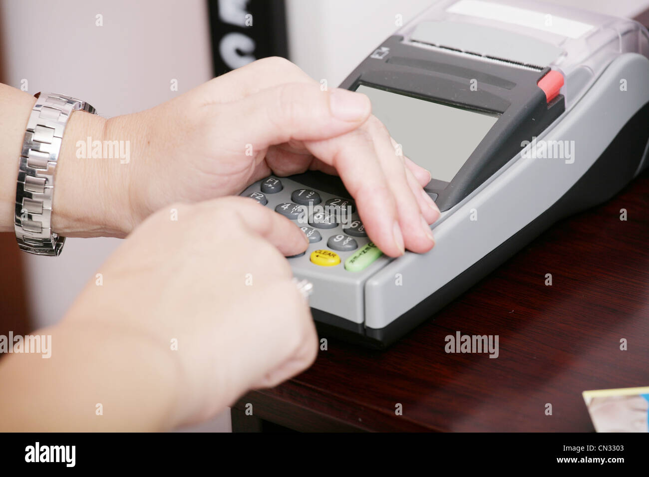 Human hand enter atm banking cash machine pin code Stock Photo - Alamy