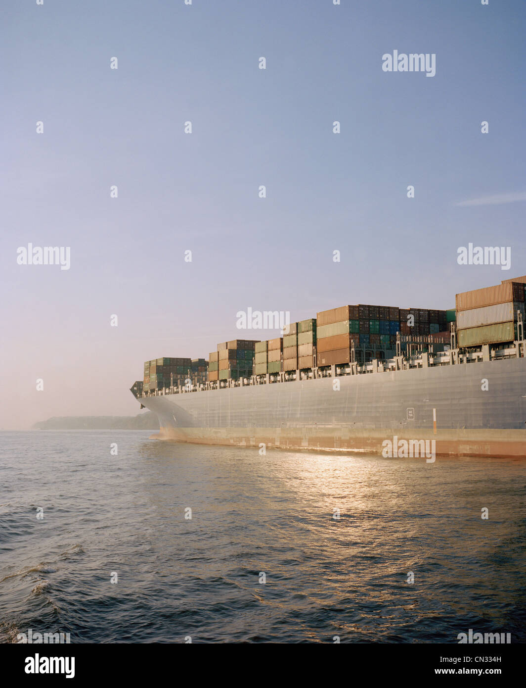 Cargo ship leaving harbour hi-res stock photography and images - Alamy
