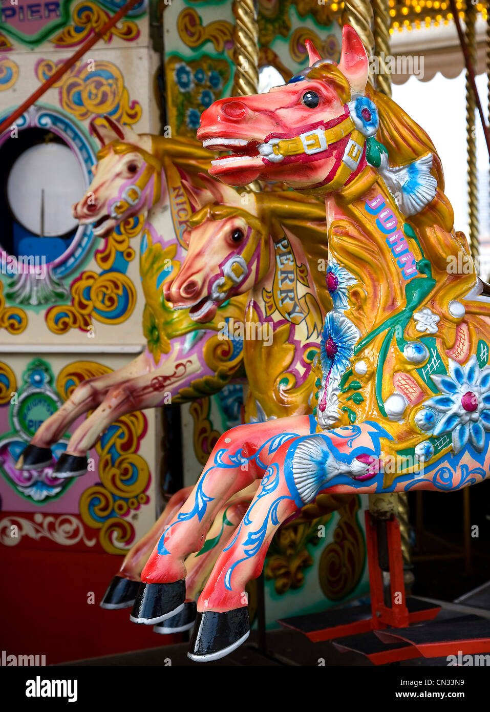 Traditional carousel horse rides at a funfair Stock Photo - Alamy