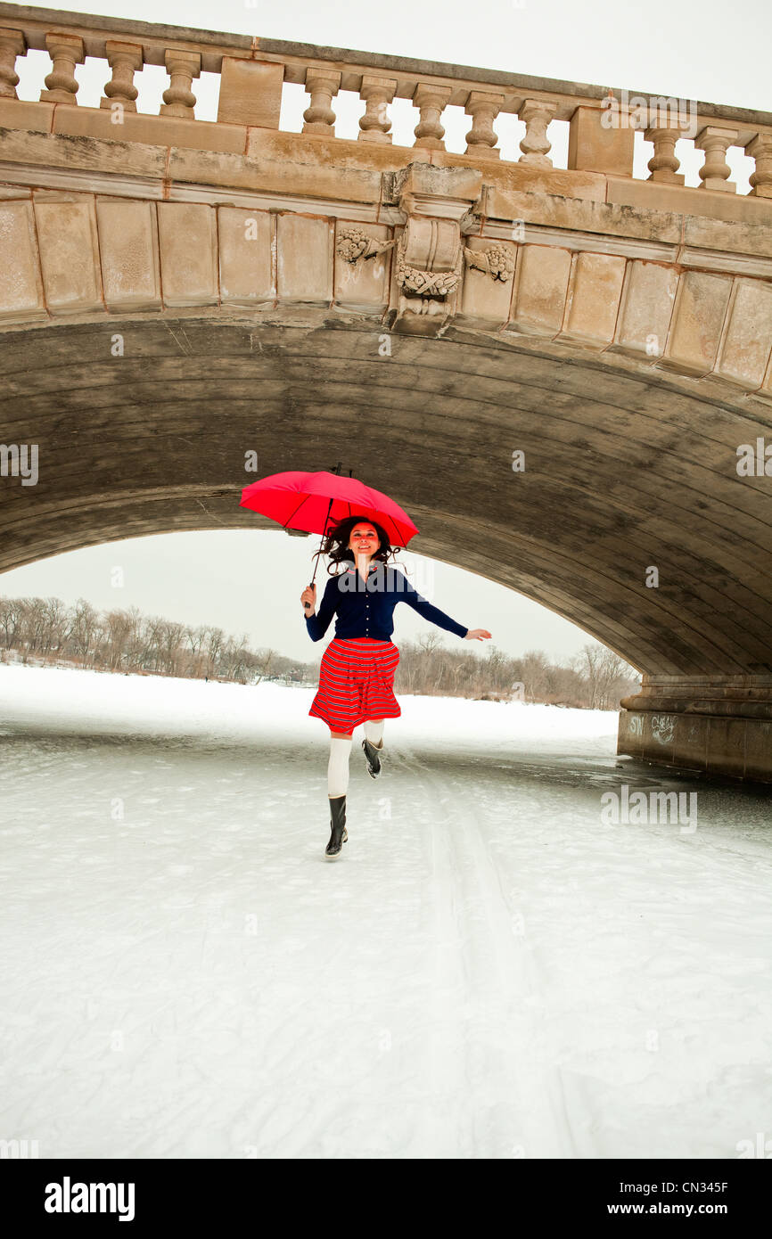 Young woman with red umbrella Stock Photo - Alamy