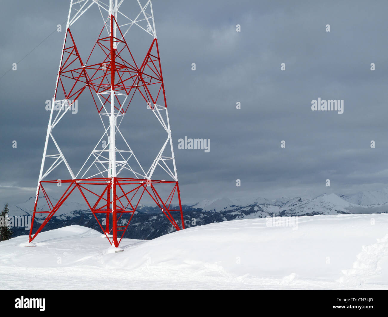 Electricity pylon on mountain, Grand Massif, French Alps Stock Photo ...