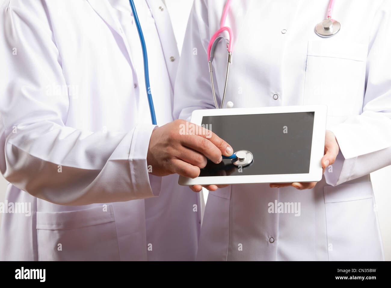 Medical doctors group. Isolated on white background Stock Photo - Alamy