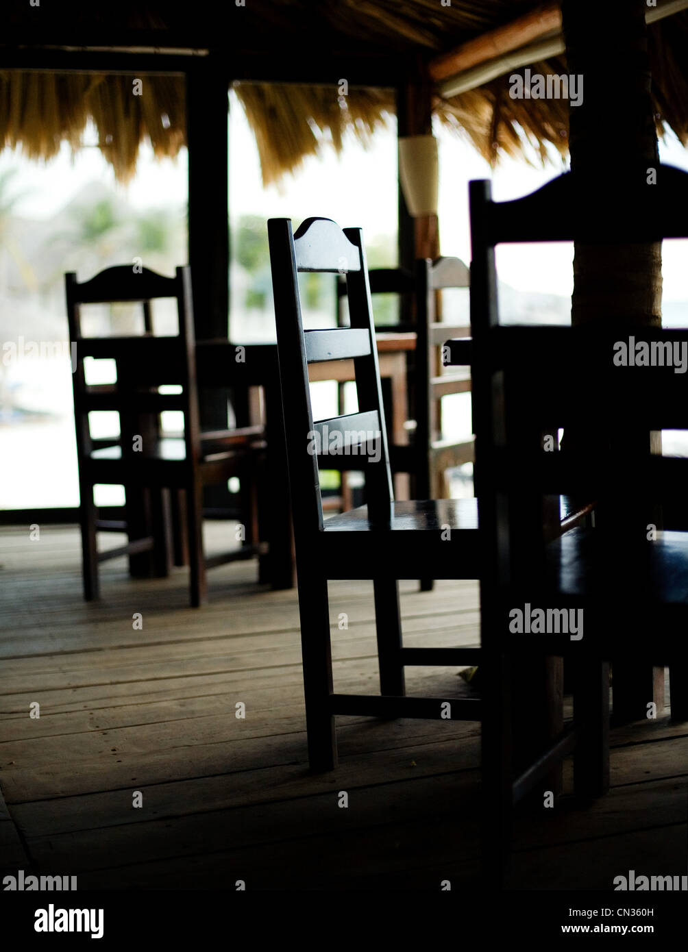 Chairs in beach hut restaurant Stock Photo - Alamy