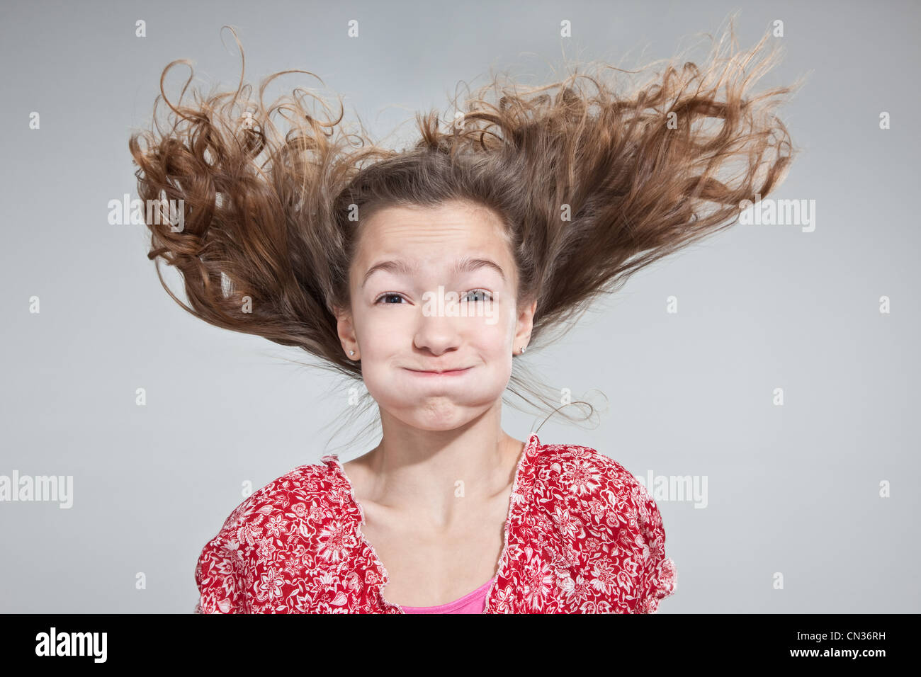 Girl with windswept hair Stock Photo - Alamy