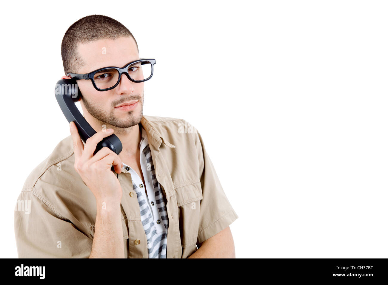 young man with a phone, isolated on white Stock Photo - Alamy