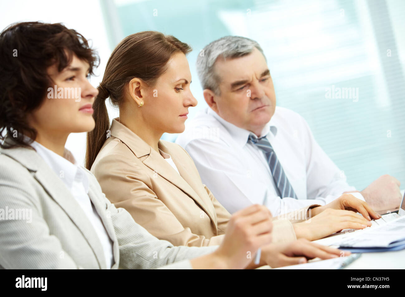 Pretty young concentrated trainee hi-res stock photography and images ...