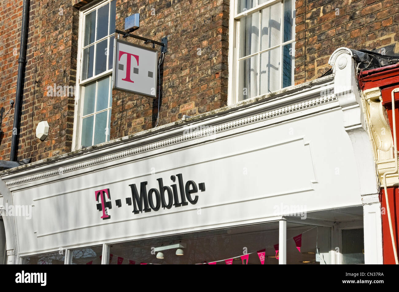 Close up of T Mobile phone shop store sign signage England UK United ...