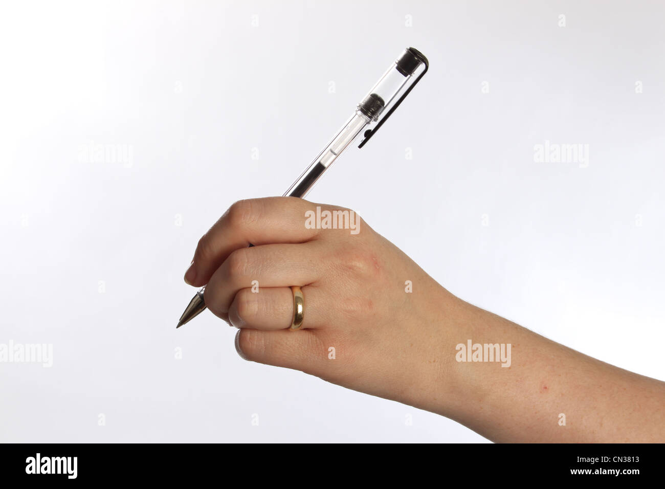 close up of a hand holding a pen Stock Photo - Alamy