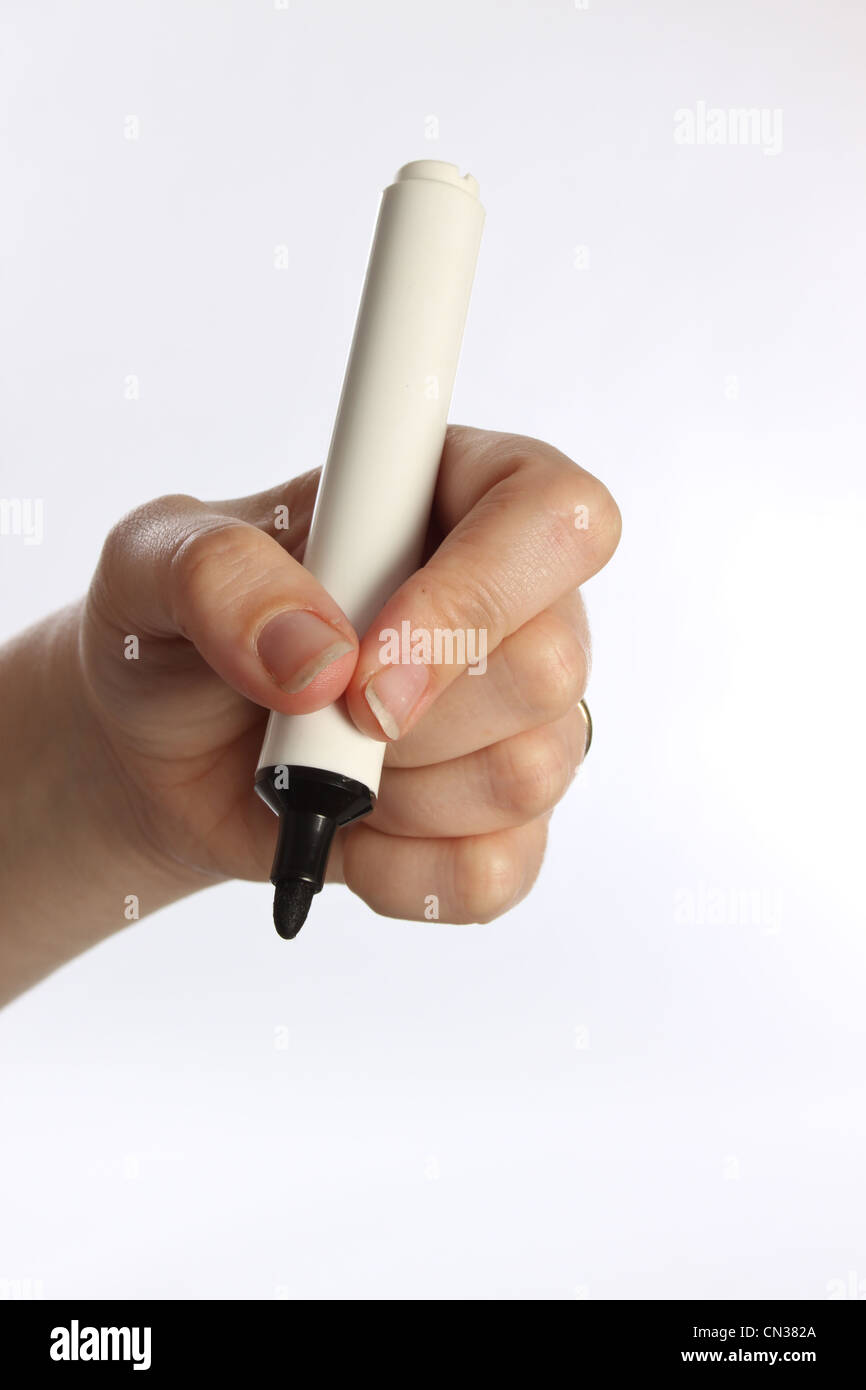 close up of a hand holding a pen Stock Photo - Alamy