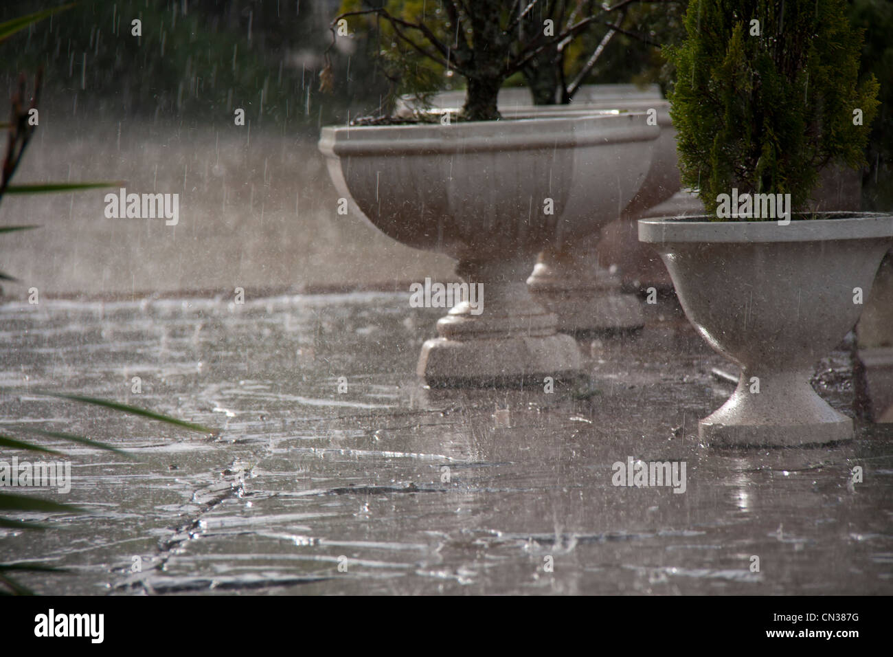 Rain on the patio Stock Photo - Alamy