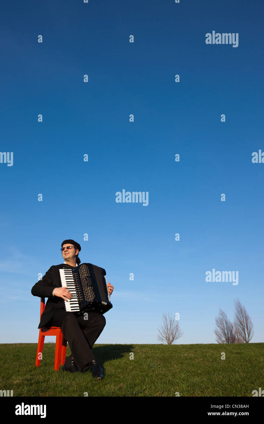 Adult accordion player hi-res stock photography and images - Alamy