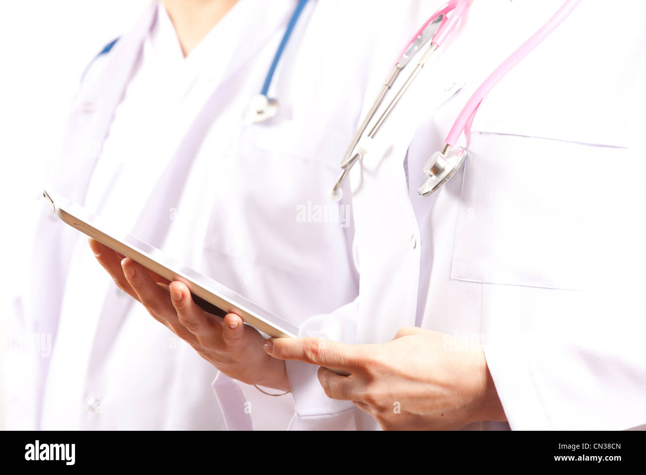 Medical doctors group. Isolated on white background Stock Photo - Alamy