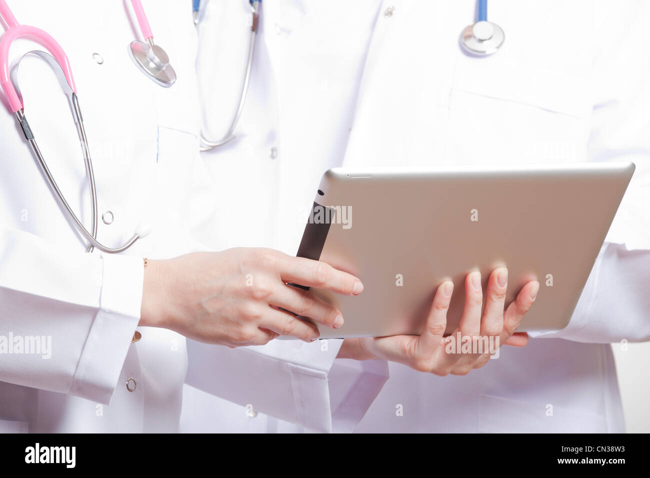 Medical doctors group. Isolated on white background Stock Photo - Alamy