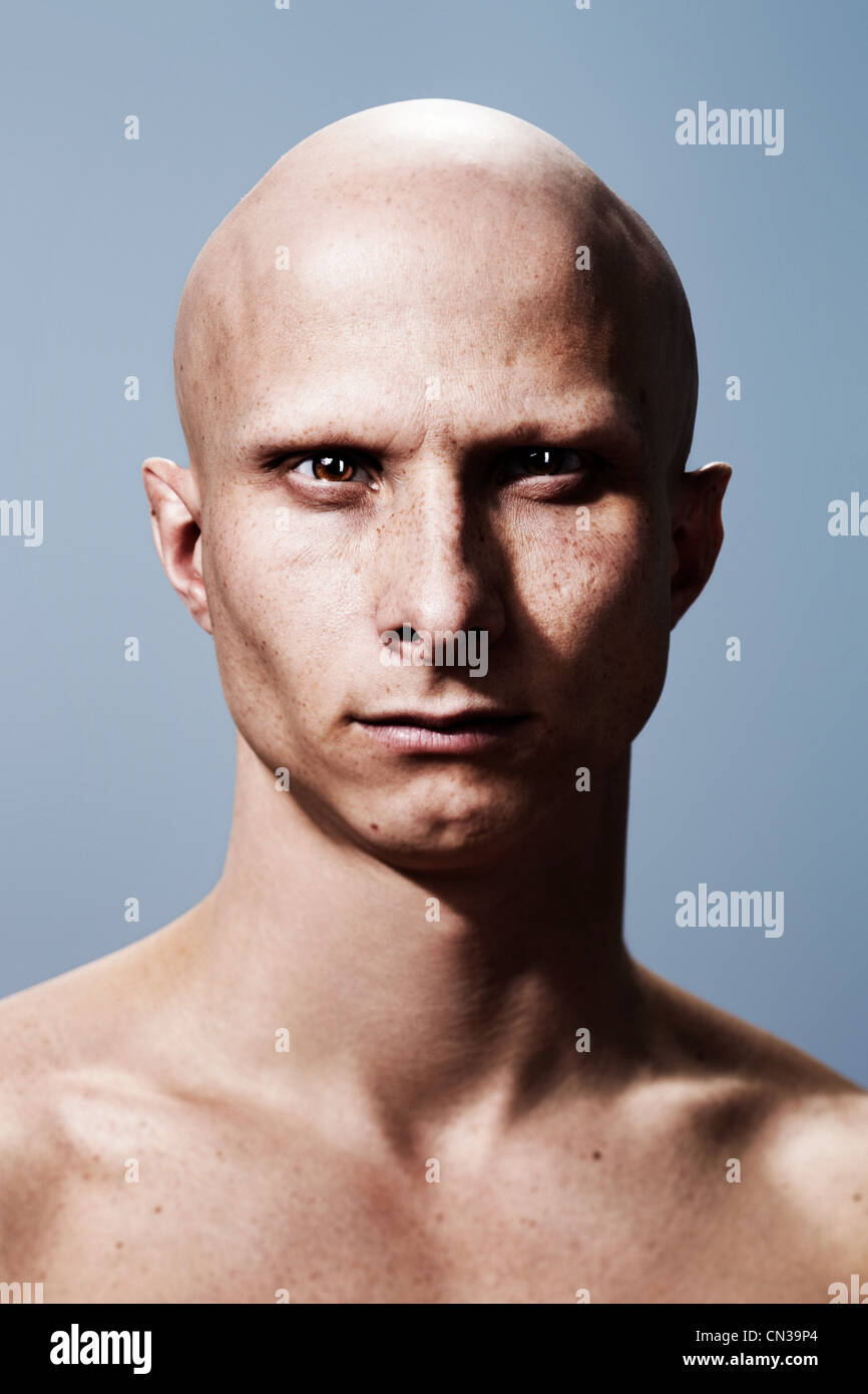 Man with shaved head Stock Photo - Alamy