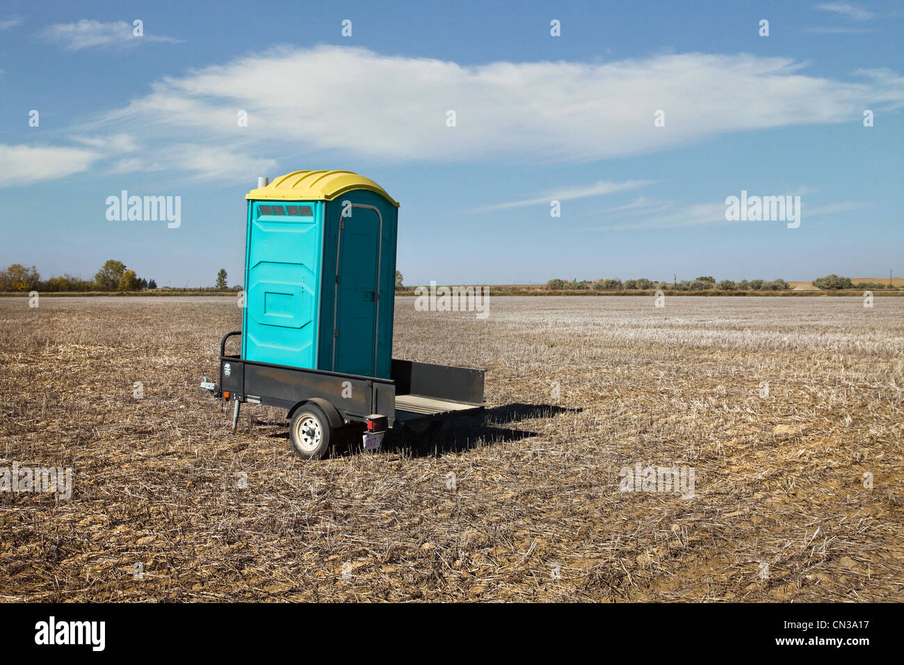 Portable toilet in field Stock Photo - Alamy