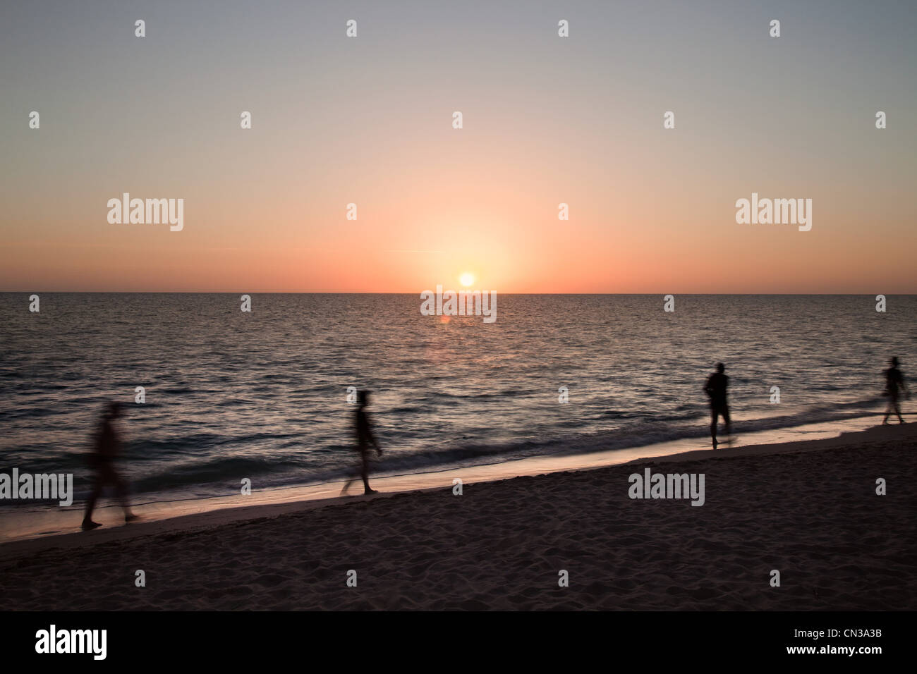 People walking on beach, Cuba Stock Photo - Alamy