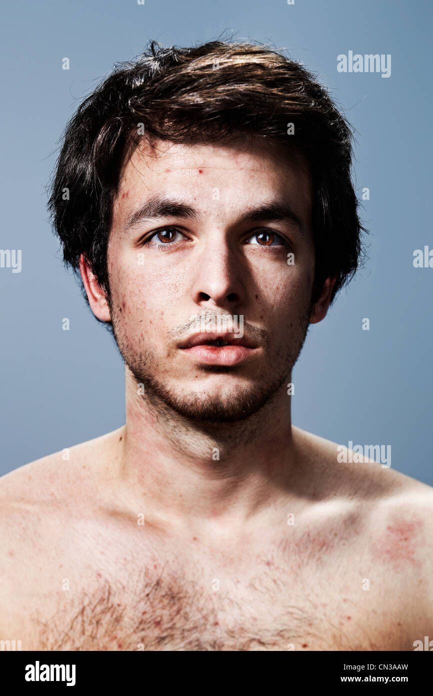 Serious looking young man Stock Photo - Alamy