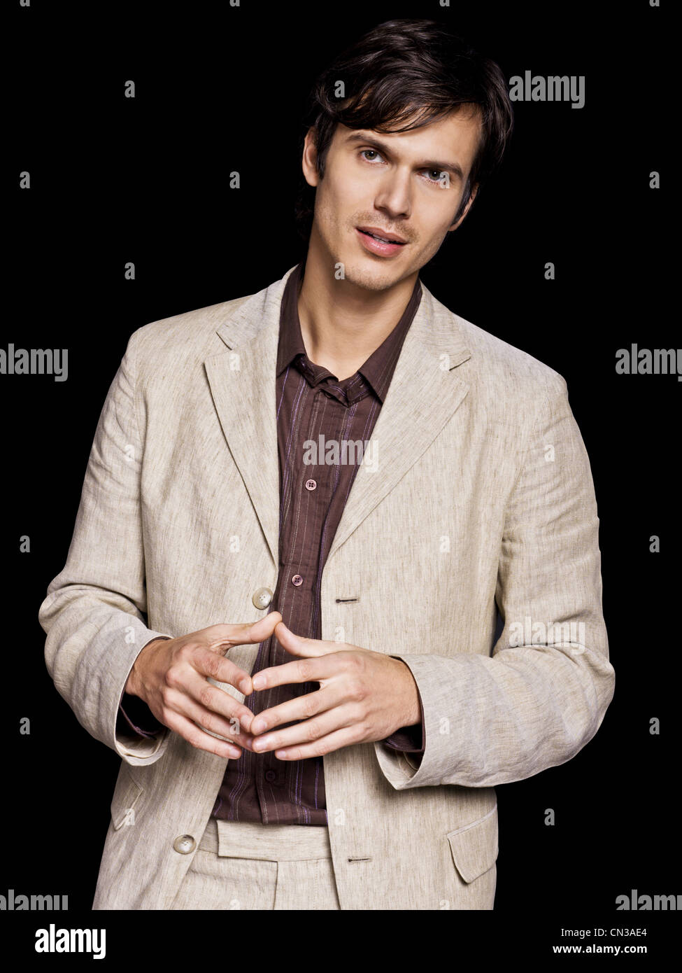 Man wearing beige jacket hi-res stock photography and images - Alamy