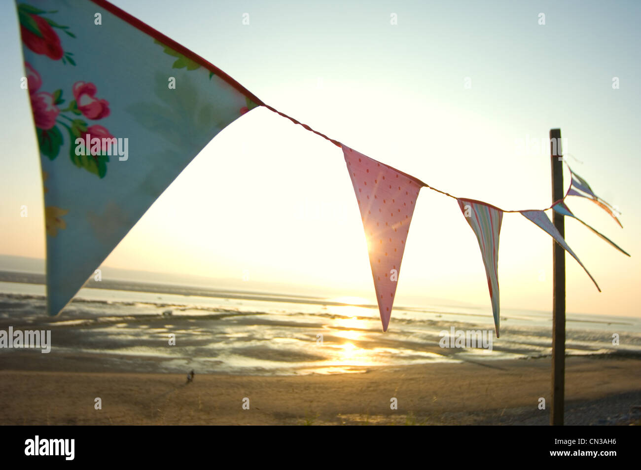 Bunting at seaside Stock Photo - Alamy