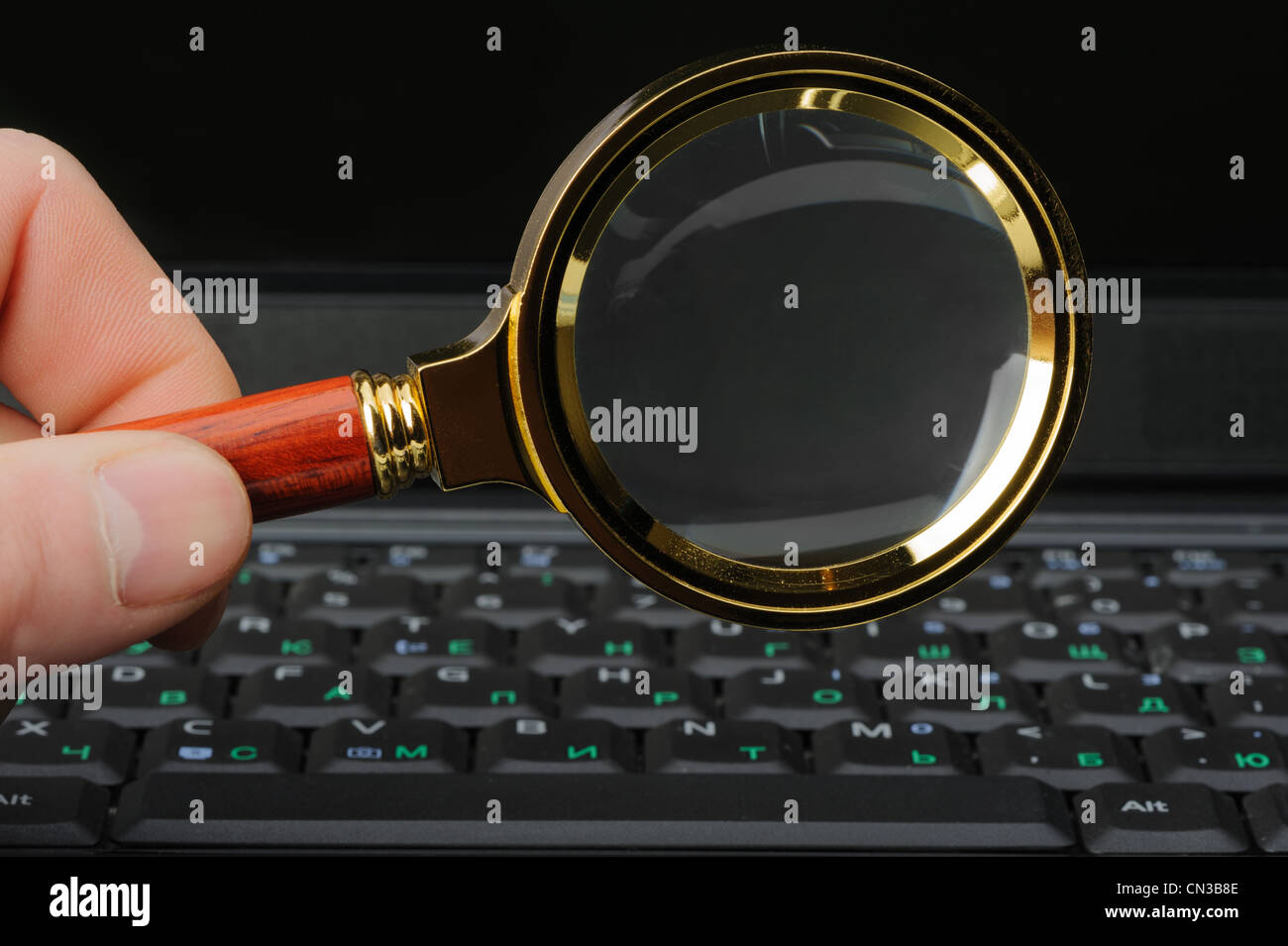 Magnifying glass laptop concept search hi-res stock photography and ...