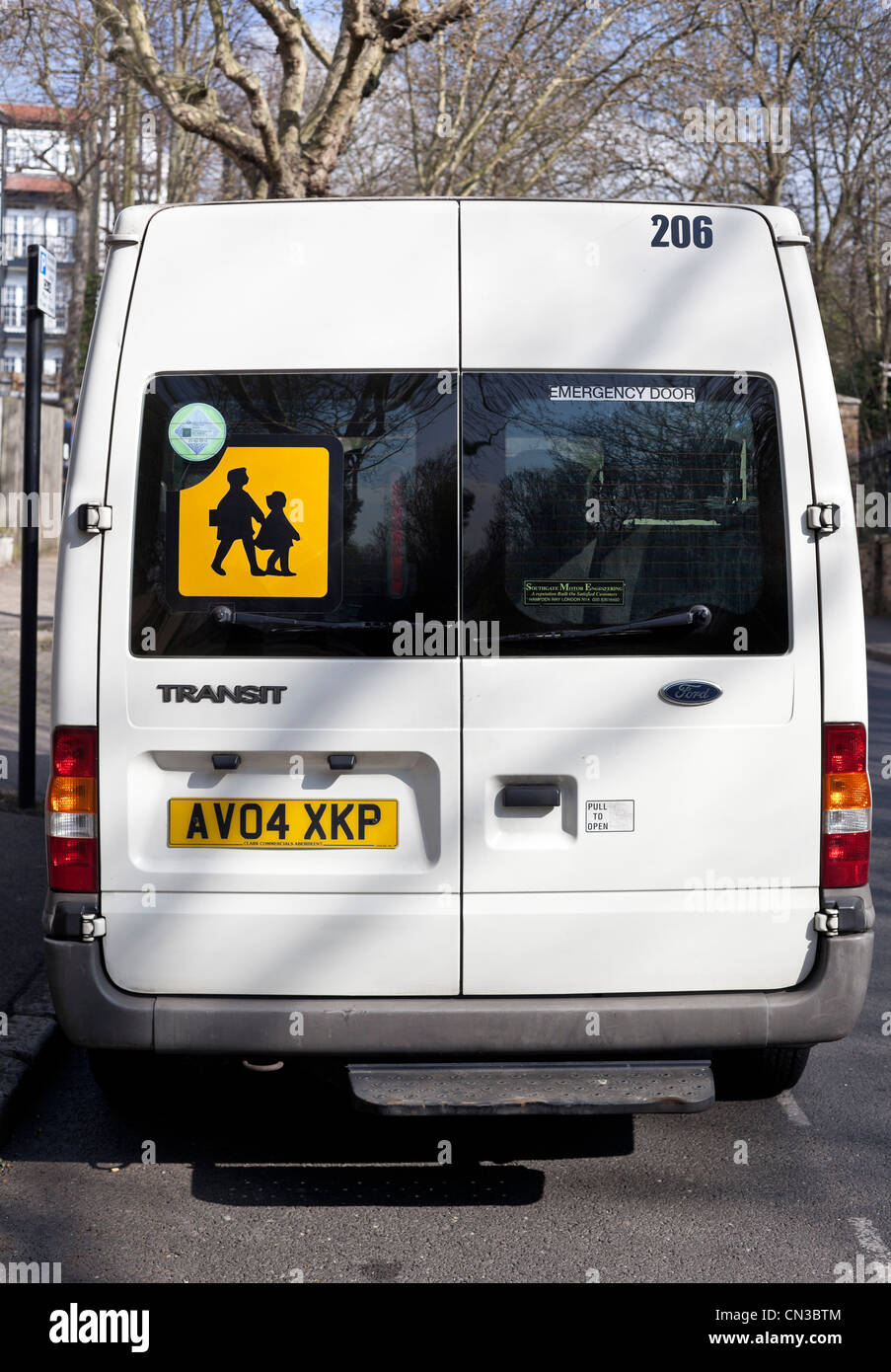 Rear view of van displaying a school children sign, England, UK Stock ...