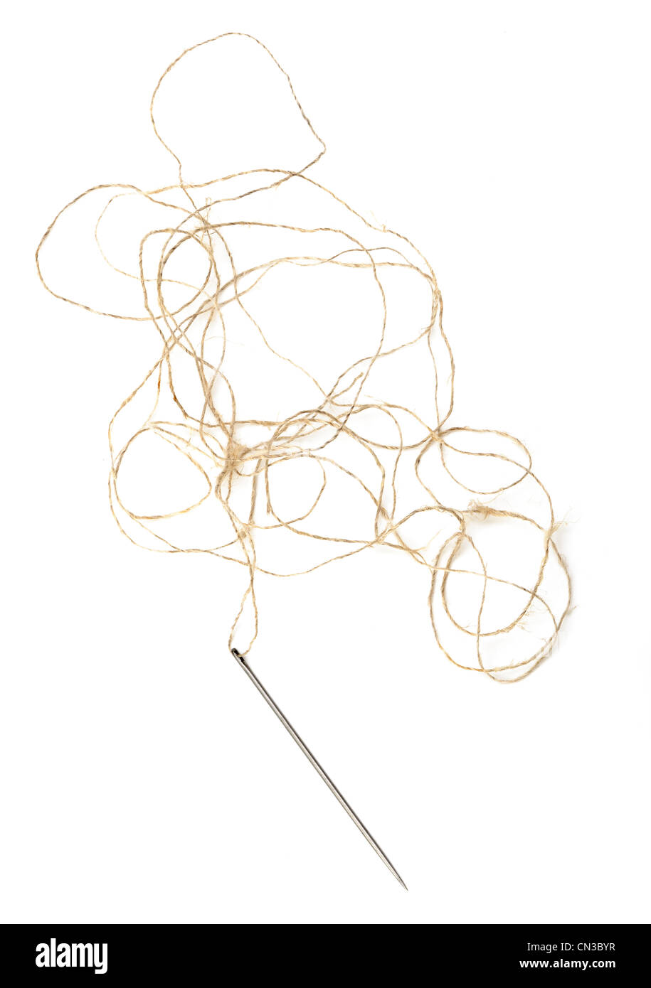 Needle and thread closeup. Isolated on white background Stock Photo - Alamy