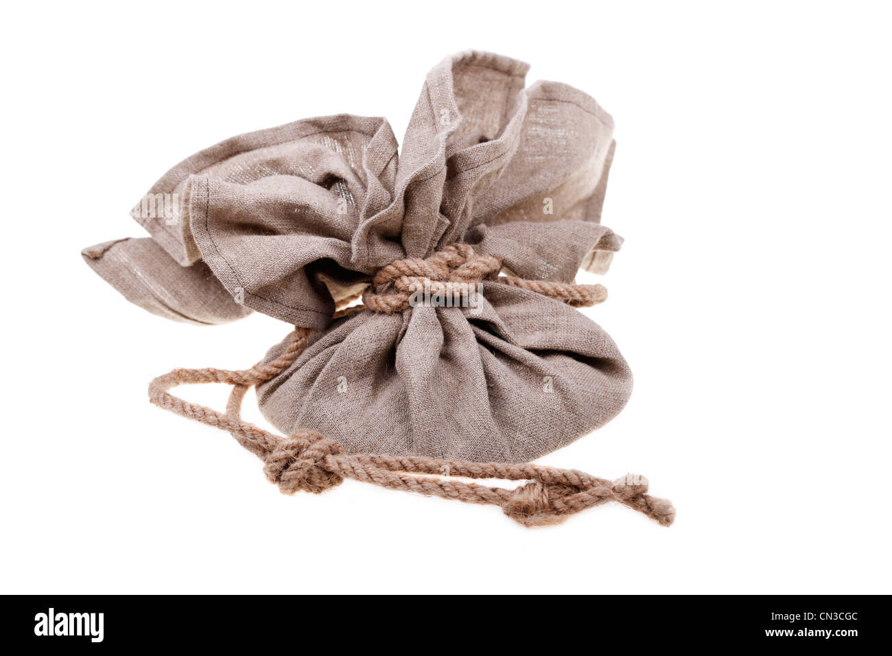 Big linen bag full of money tied by rope. Money and savings concept on ...