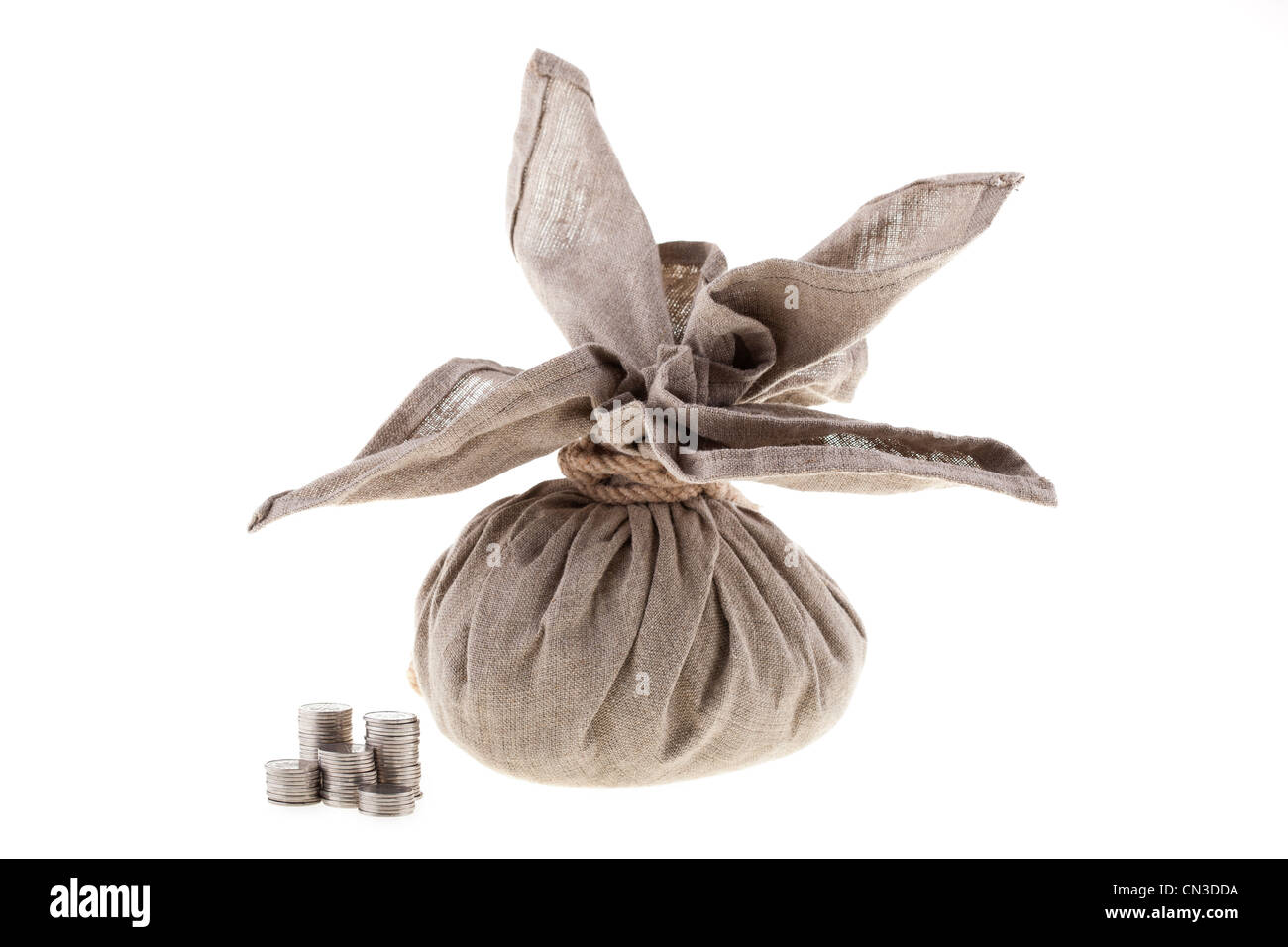 Big linen bag full of money tied by rope and one polish zloty coin ...