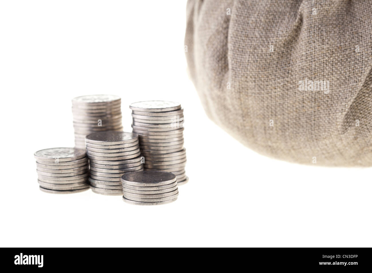 Big linen bag full of money tied by rope and one polish zloty coin ...