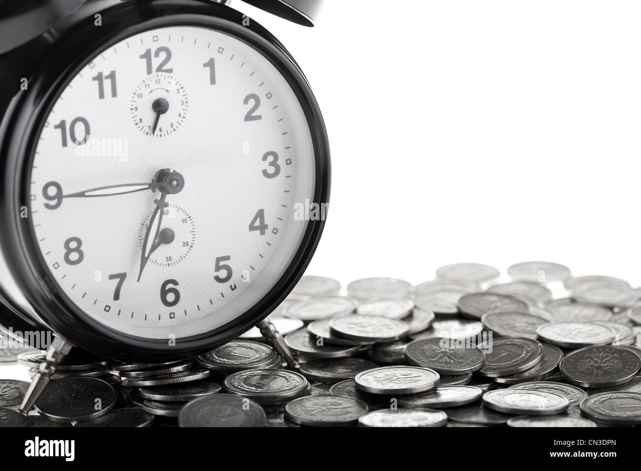 Beautiful old clock staying on one polish zloty coins. Time is money ...