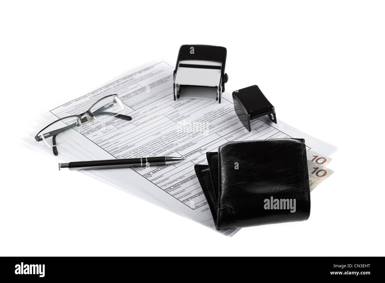 Business documents, wallet with polish paper money, pen, stamp and ...