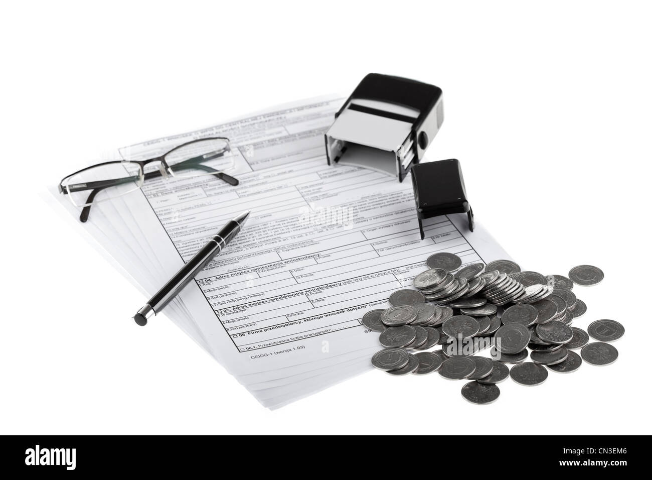 Business documents, polish coins, pen, stamp and eyeglasses. Money and ...