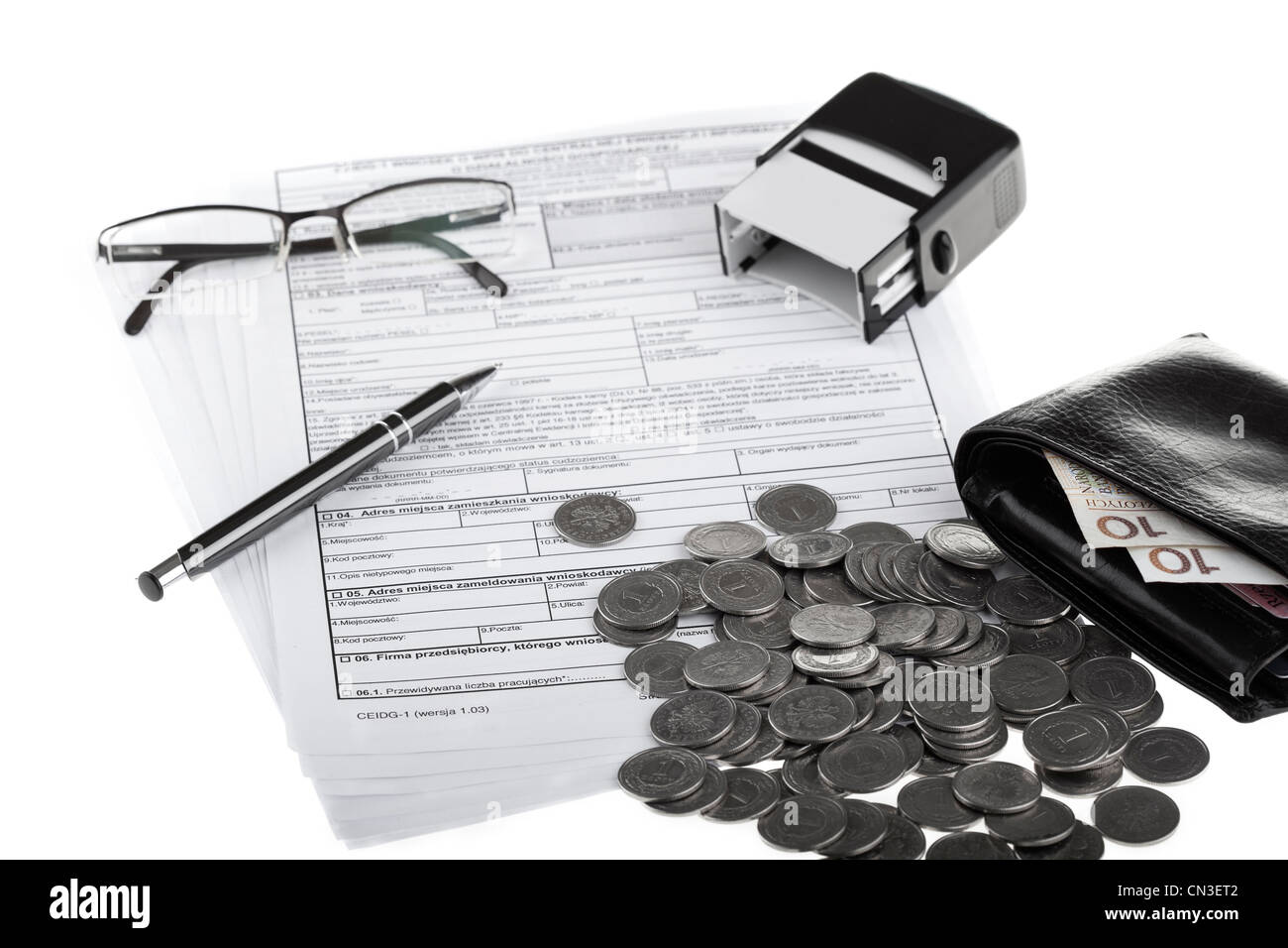 Business documents, wallet with polish paper money, pen, stamp and ...