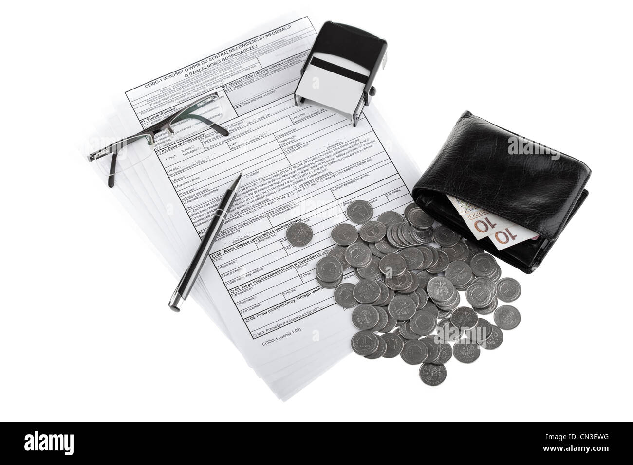 Business documents, wallet with polish paper money, pen, stamp and ...